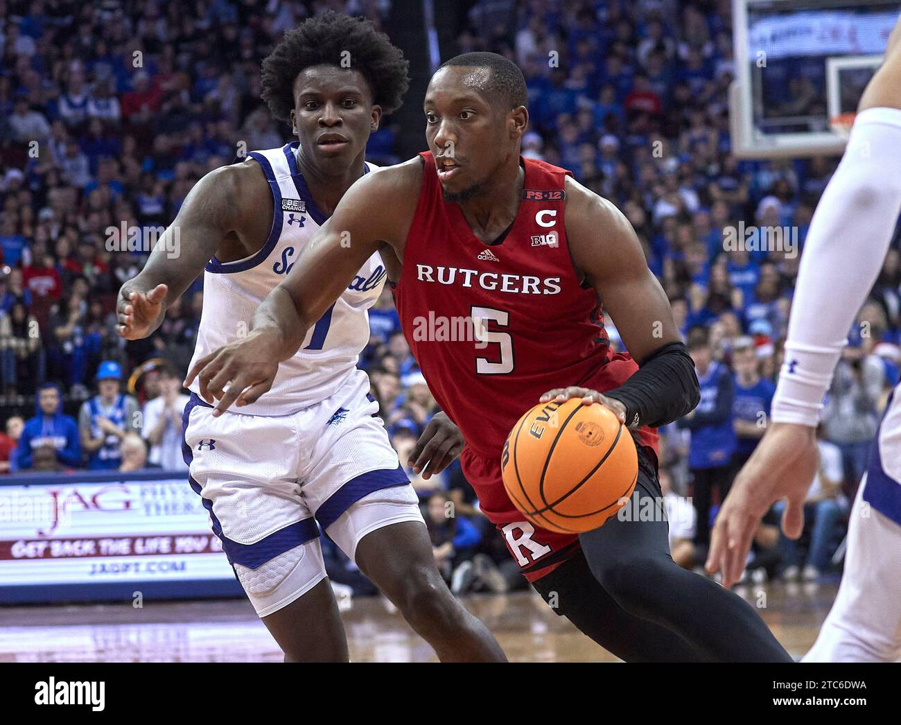 Rutgers Scarlet Knights forward Aundre Hyatt (5) drives by Seton Hall ...
