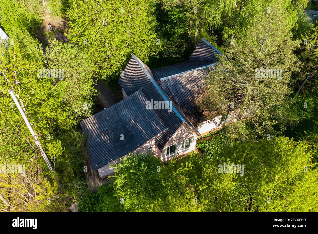 Aerial view of the roof of a wooden building in the middle of colorful ...