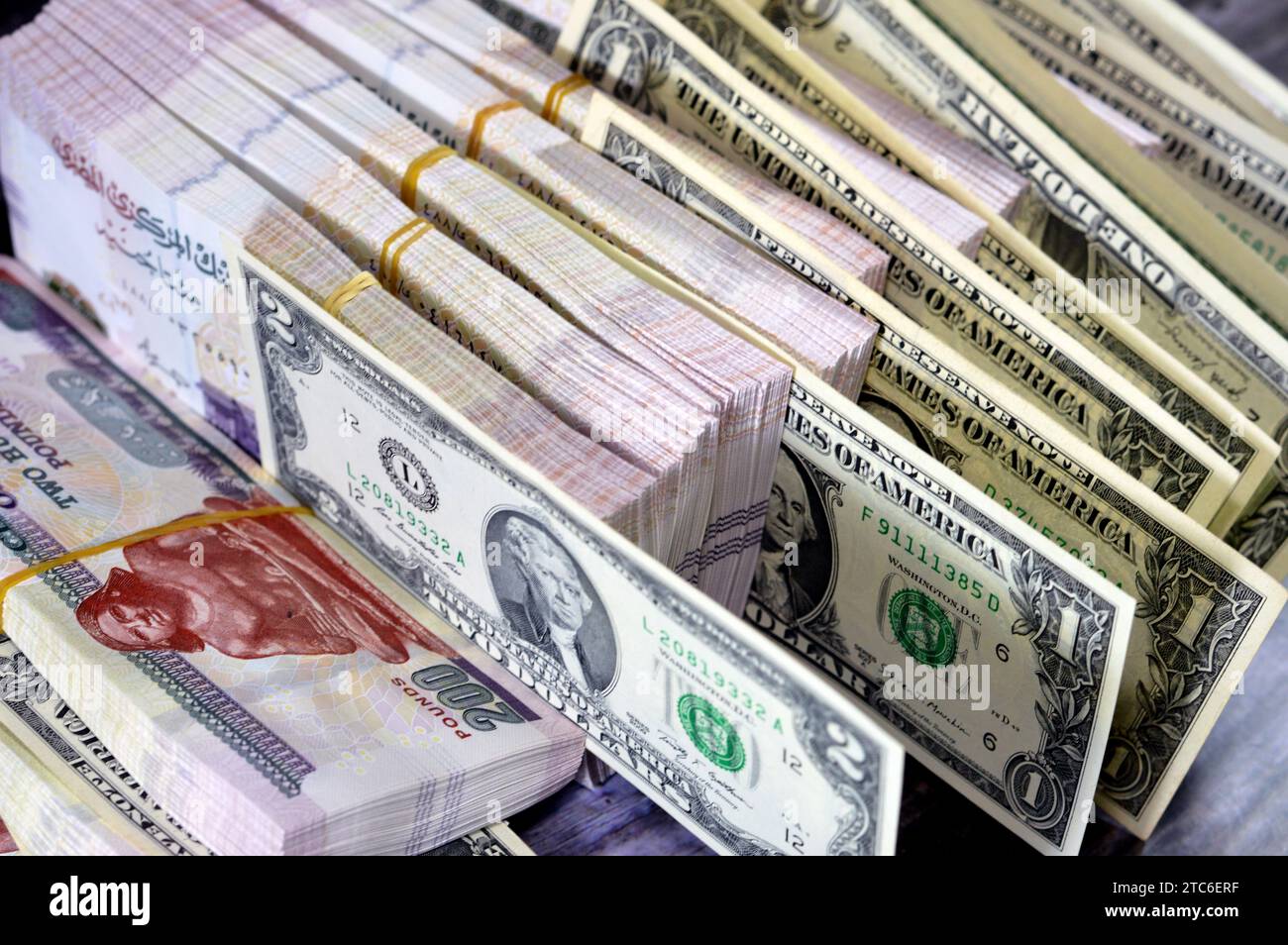 Two piles of one dollar bills hi-res stock photography and images - Alamy