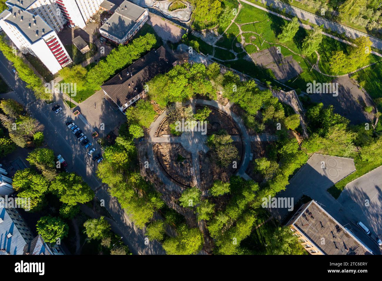 Aerial view of the reconstruction of a circular city square with paths ...