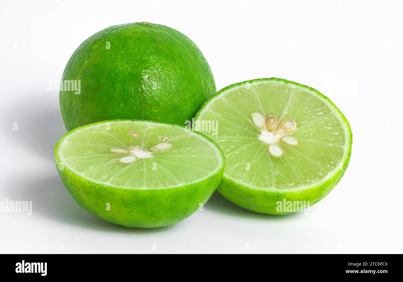 Fresh lime and slice, On white background Stock Photo - Alamy