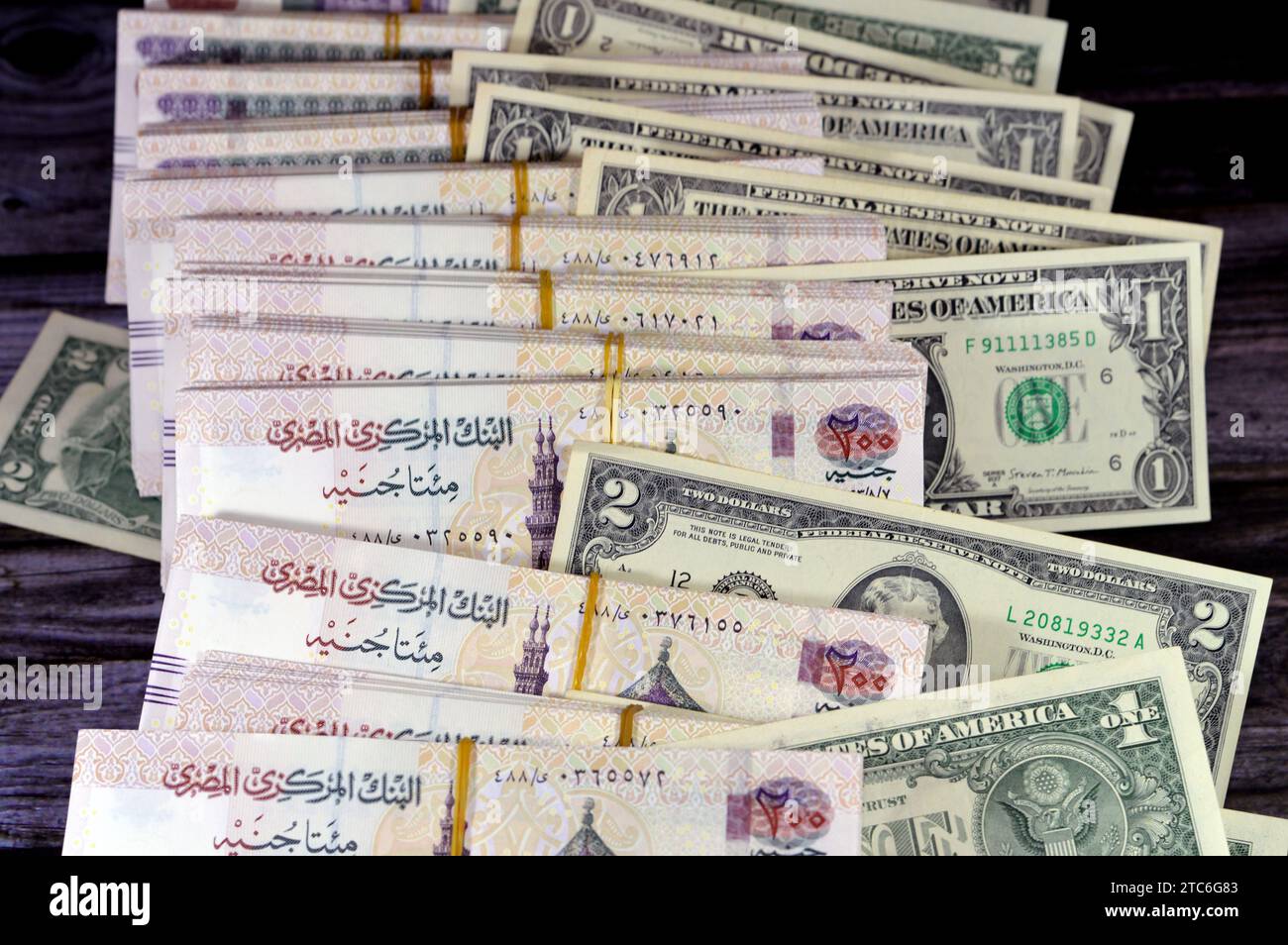 Two piles of one dollar bills hi-res stock photography and images - Alamy