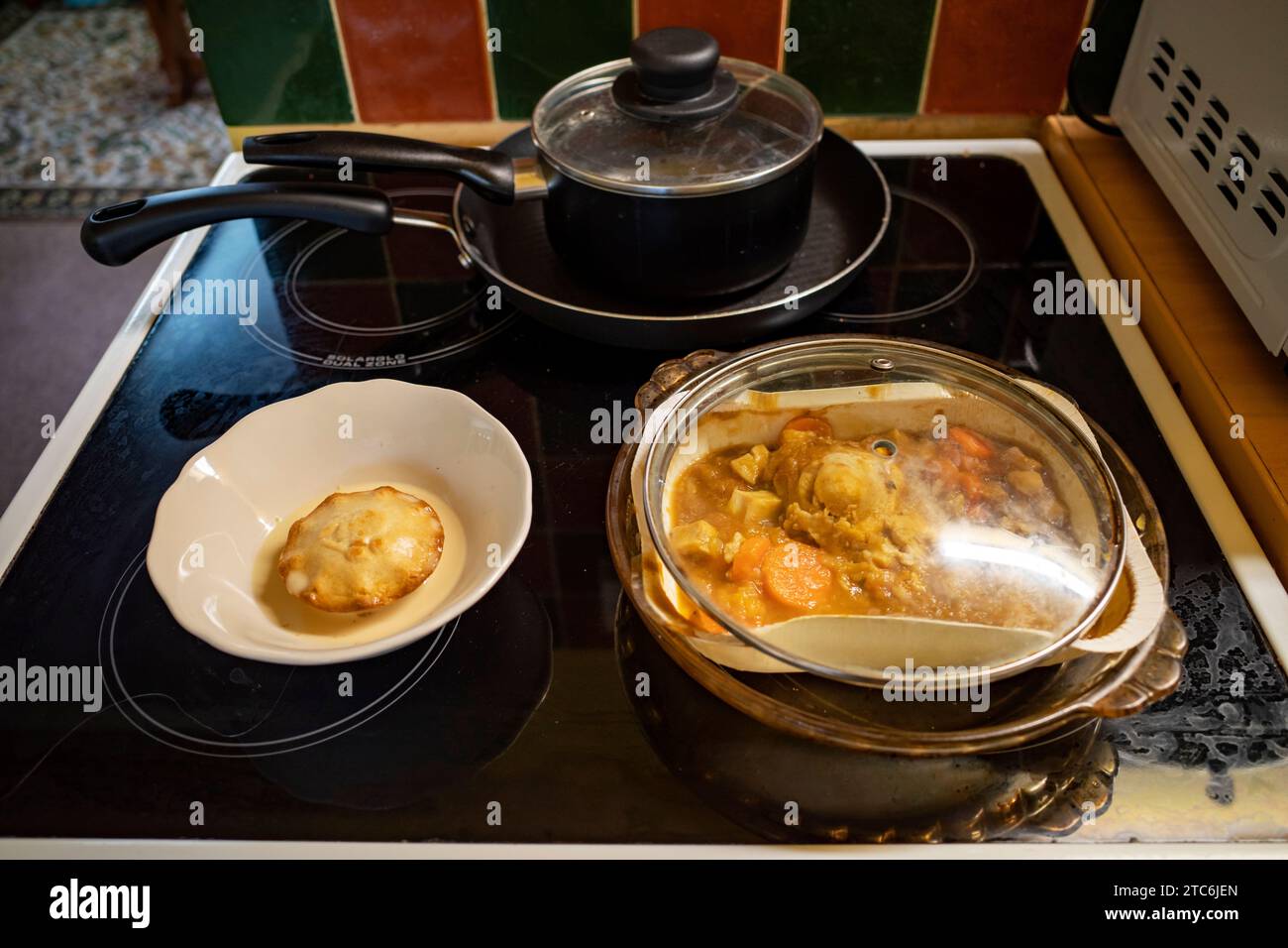 Cooked meal ready to be re-heated Stock Photo - Alamy
