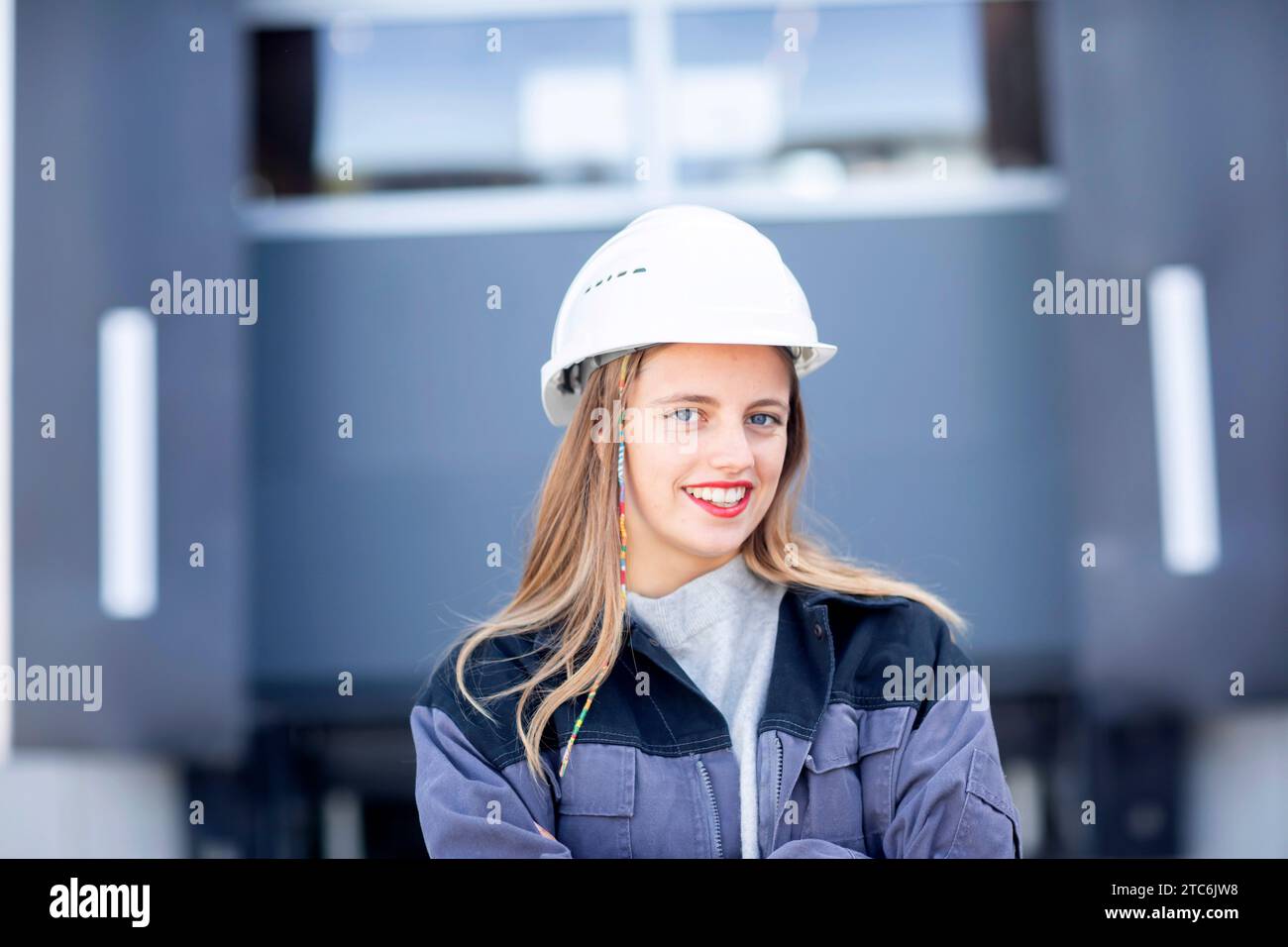 Young engineer female helmet hi-res stock photography and images - Alamy