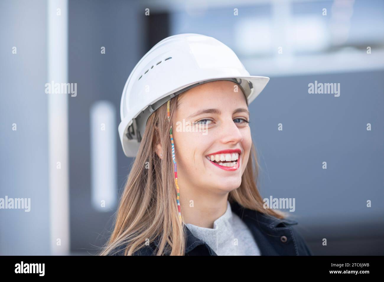 Young engineer female helmet hi-res stock photography and images - Alamy