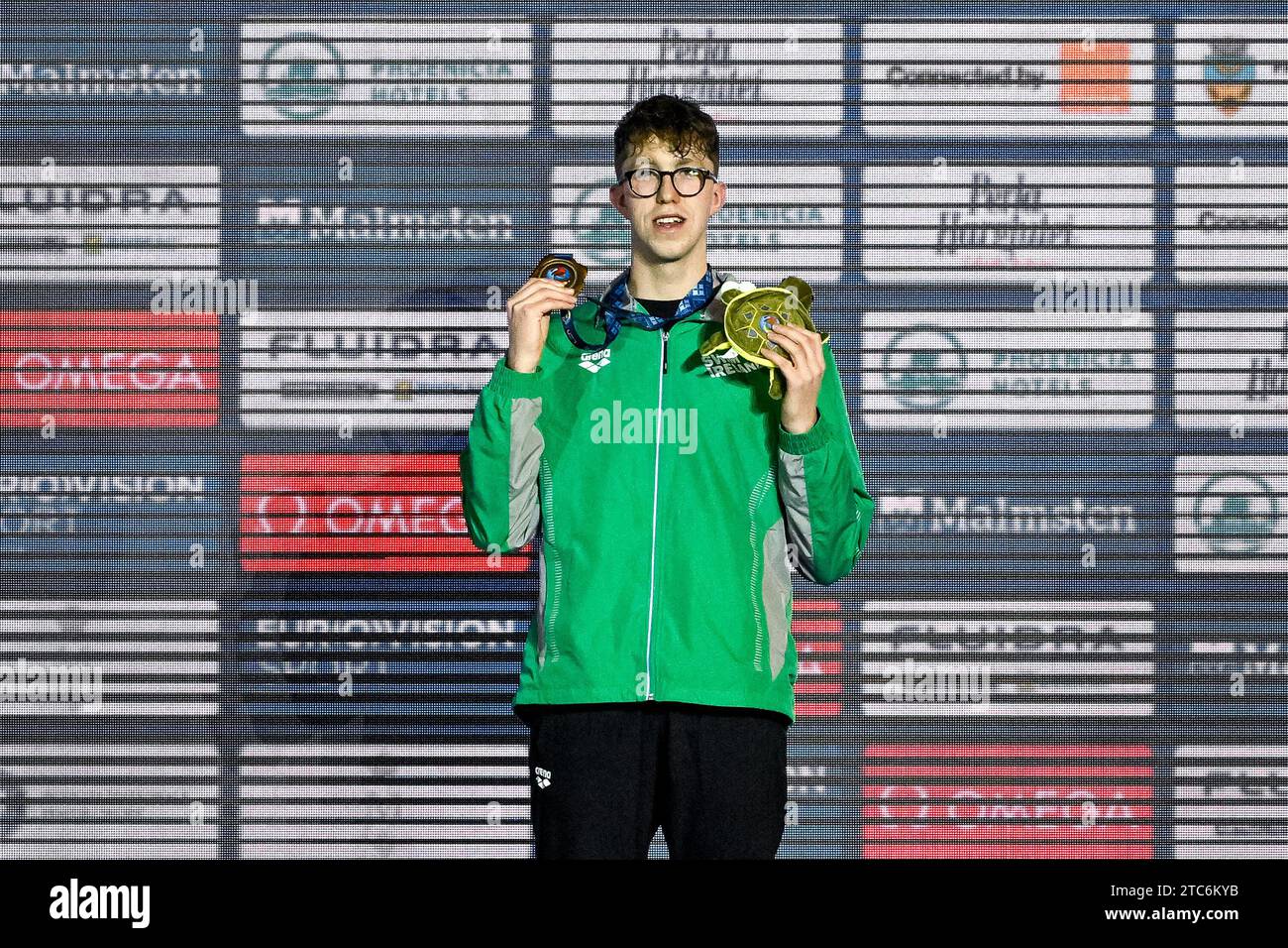 Daniel Wiffen of Ireland shows the gold medal after competing in the ...