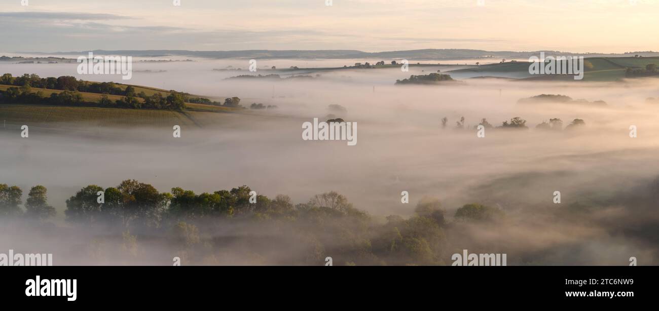 Misty dawn at Berry Pomeroy in Devon, England. Autumn (September) 2023 ...