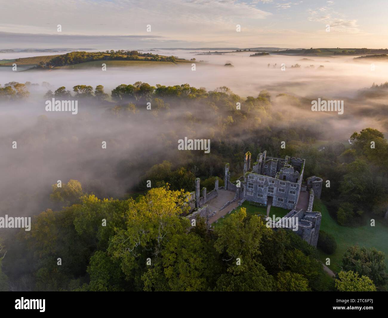 Misty dawn at Berry Pomeroy Castle in Devon, England. Autumn (September ...