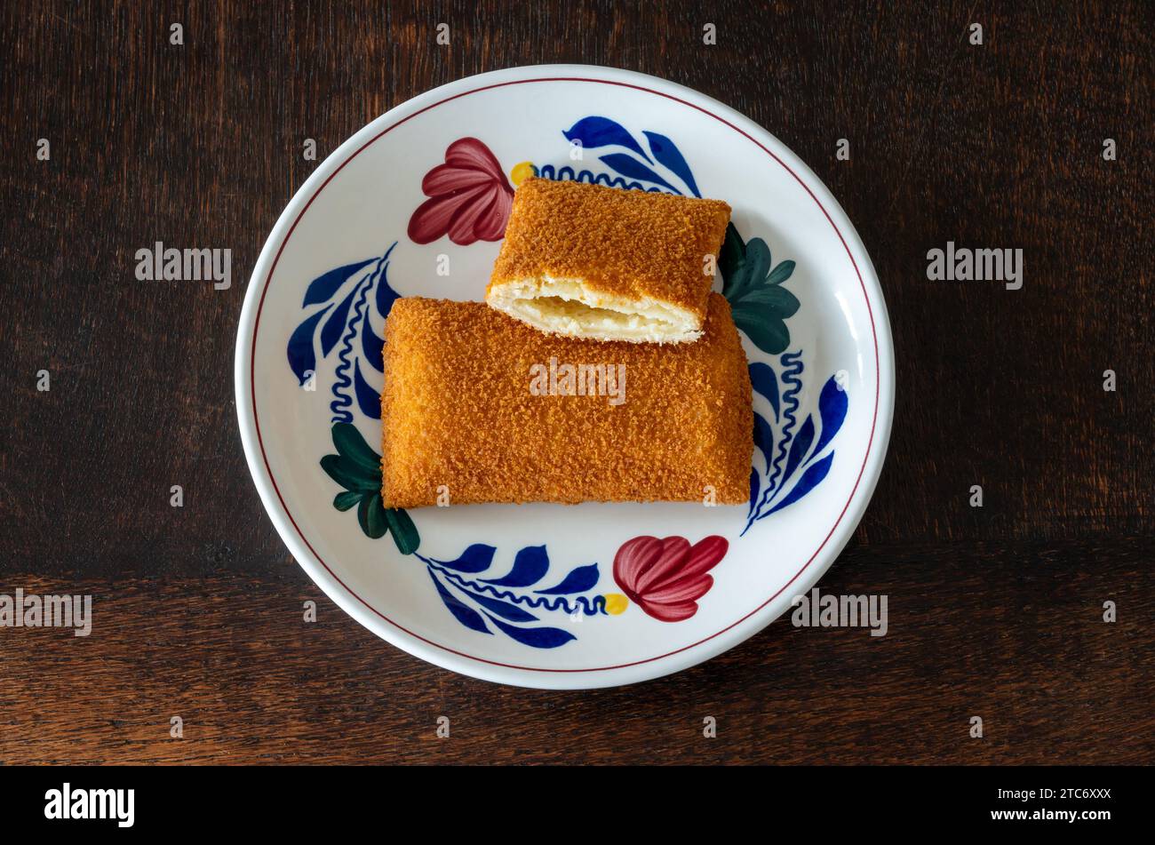 Kaassouffle on the plate, a popular dutch fast food snack consisting of ...