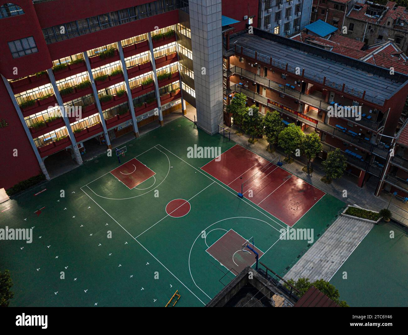 A brightly-lit middle school playground in Wuhan, China, illuminated by ...