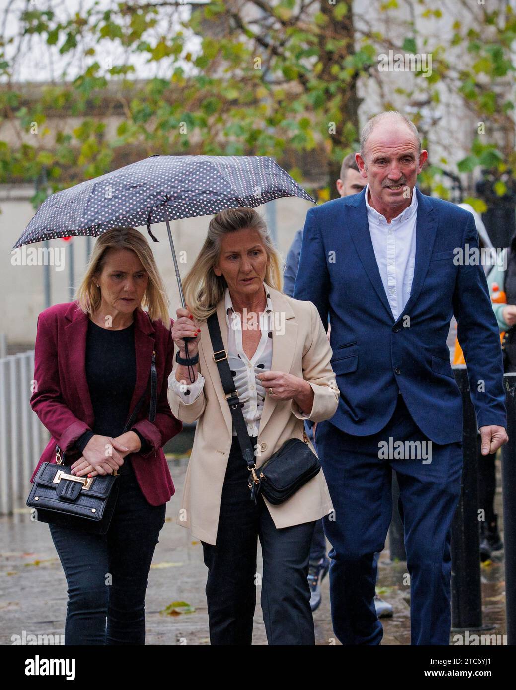 Marie Ferguson (centre) with her husband Raymond (right) arriving to ...