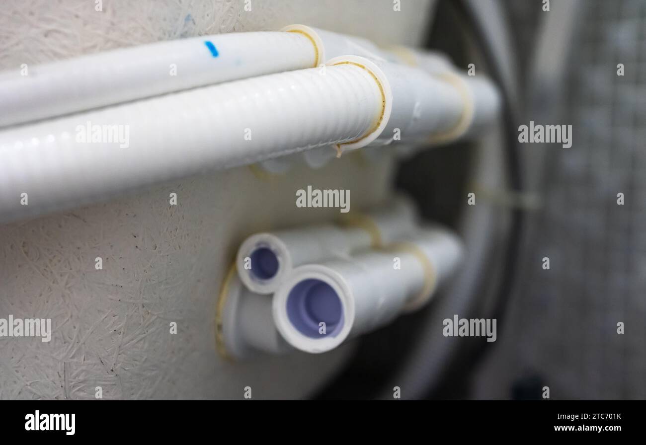 Pipe system of bathtub with hydromassage Stock Photo - Alamy