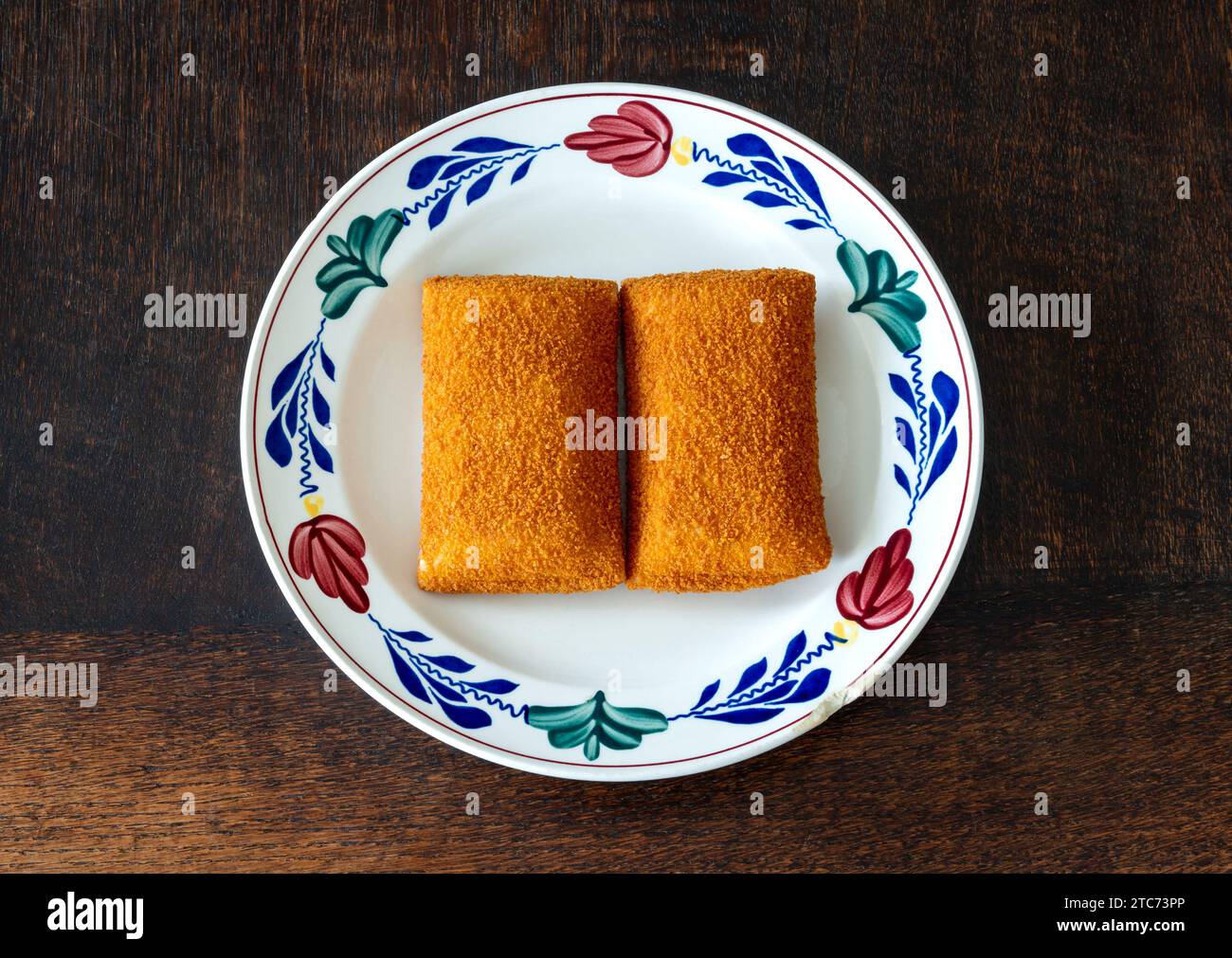 Kaassouffle on the plate, a popular dutch deep fried fast food snack ...