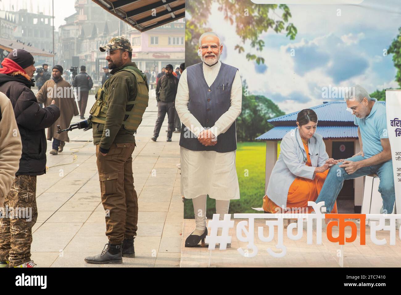 Indian policeman stands guard along a road in Srinagar ahead of Supreme ...