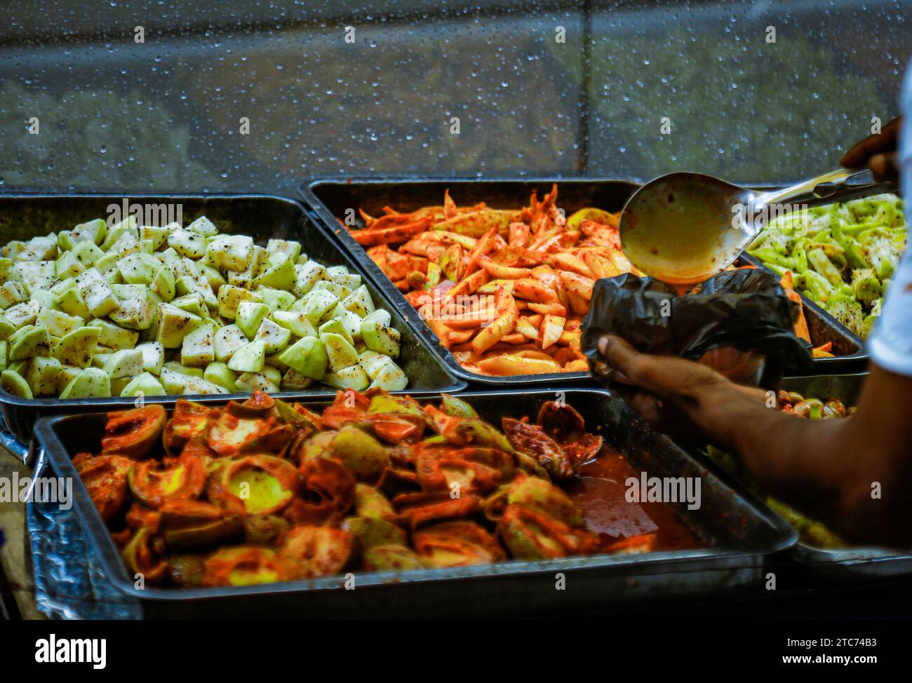 A pickle made from a variety of fruits, this dish is a popular snack in ...