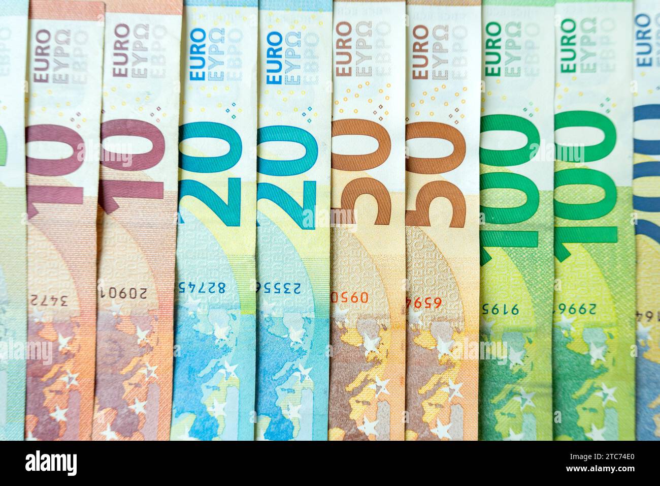 beautiful new clean multicolored euro banknotes scattered on the ...