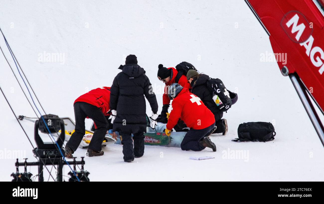 Ski Patrol attend to Eli Bouchard after his 2nd semi-final run ends in ...