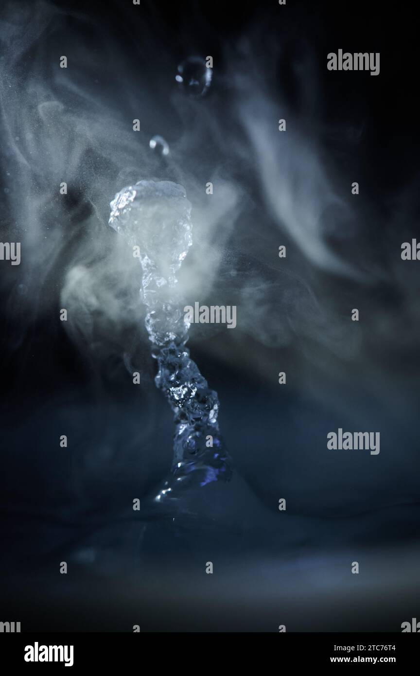 The process of boiling water, a stream of water shooting out of a ...