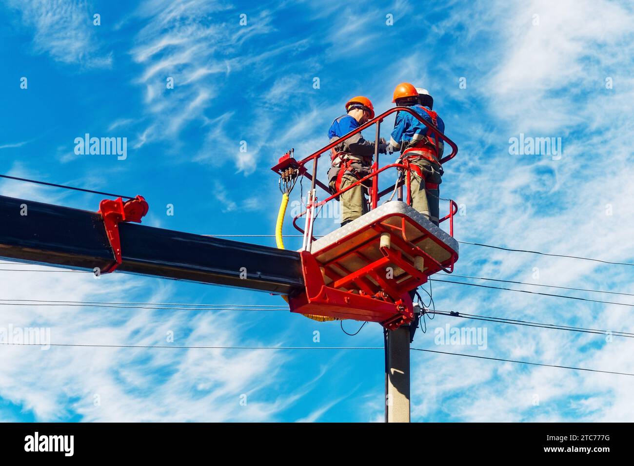 Worker climbing utility pole hi-res stock photography and images - Alamy
