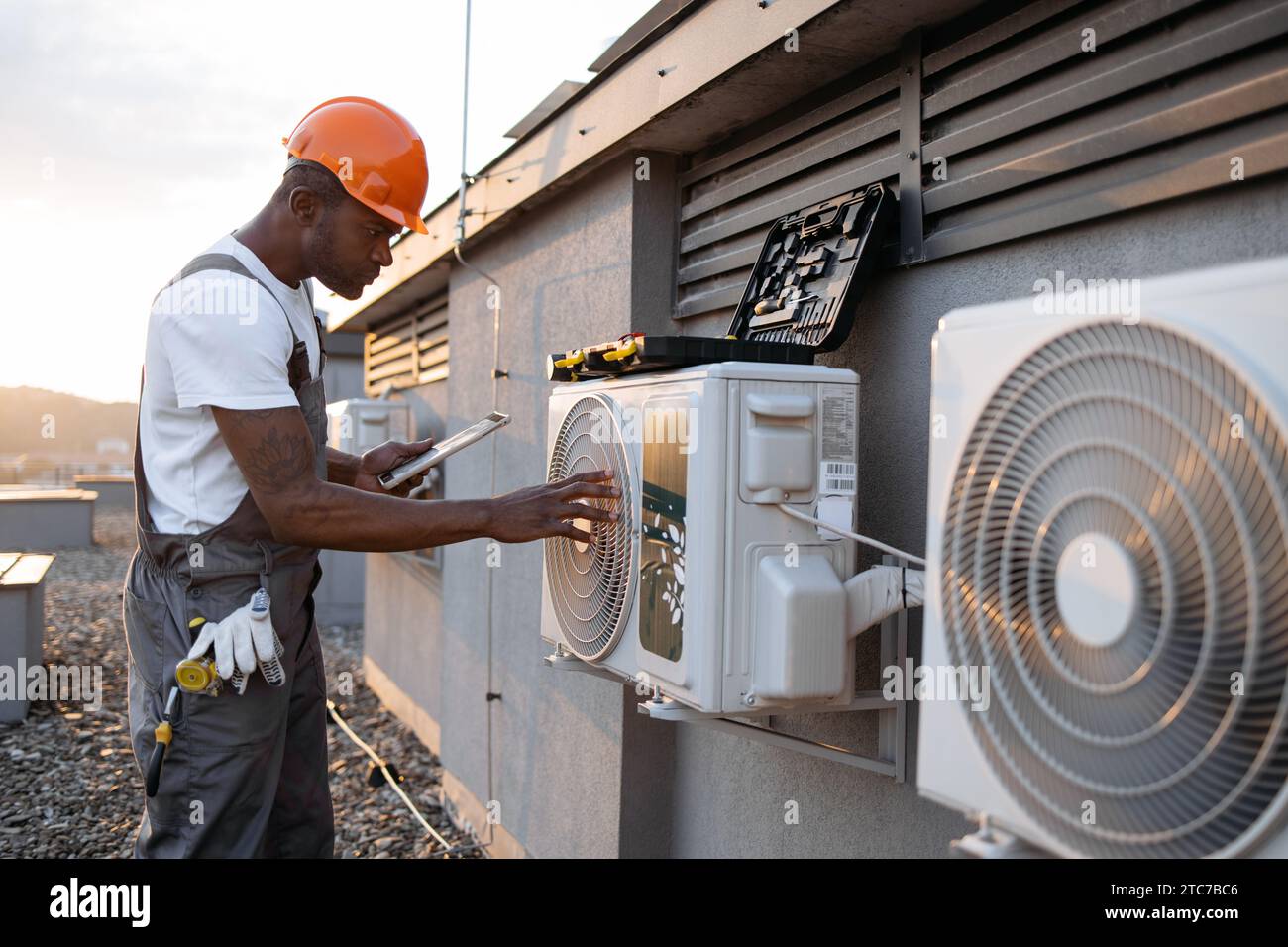 Male holding tablet installing hi-res stock photography and images - Alamy