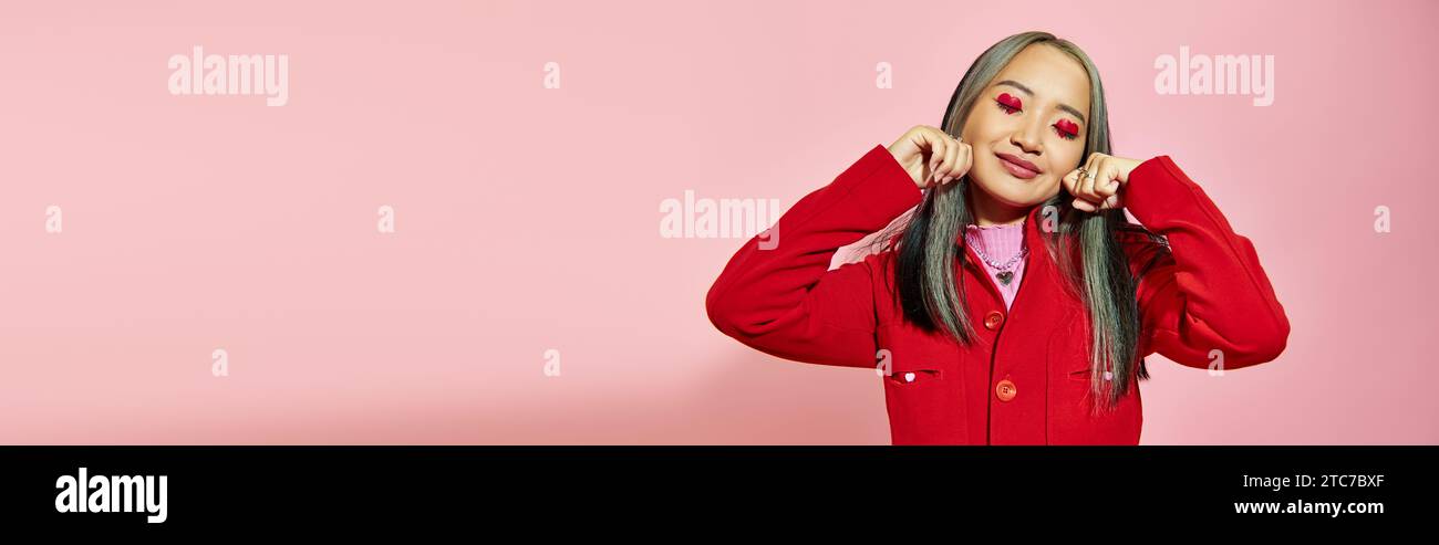 young asian woman with heart shaped eye makeup showing crying gesture ...