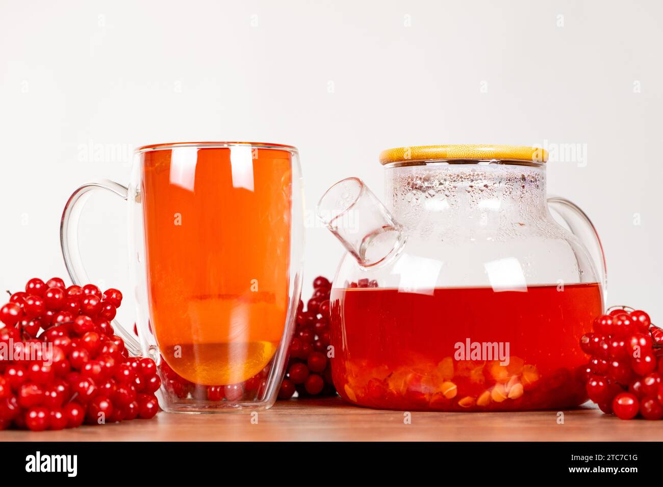 Berry viburnum tea in a cup and teapot. Making Healthy Vitamin Tea ...