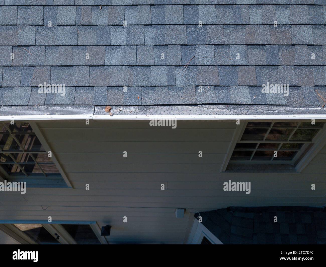Drone photos of a residential roof after a replacement with asphalt ...