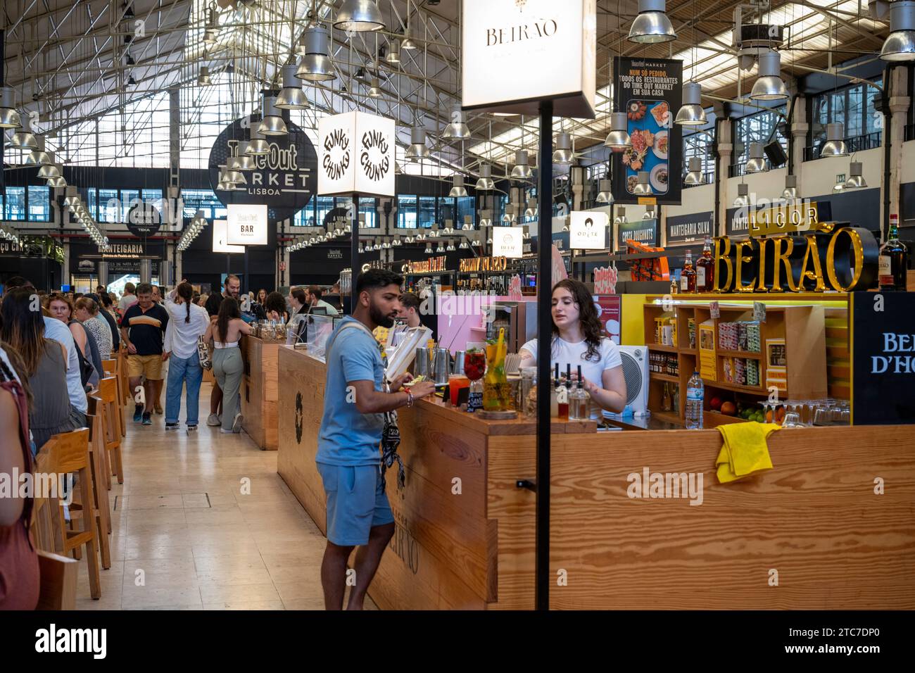 People at the Time Out Market Lisboa, a food hall and major touristic ...