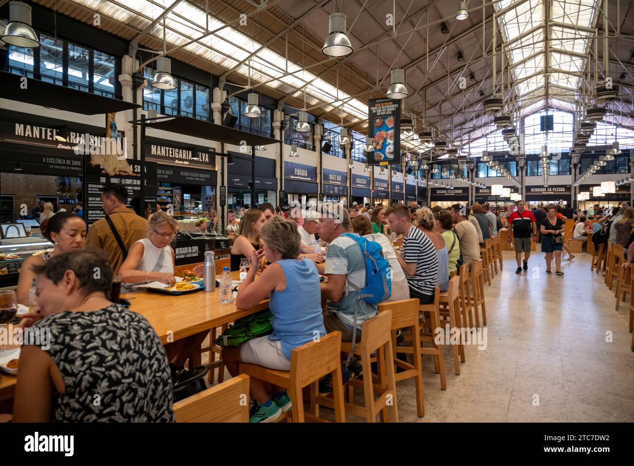 People at the Time Out Market Lisboa, a food hall and major touristic ...