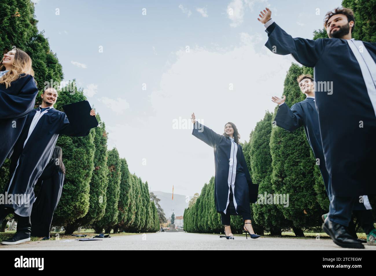 Group of international students saying goodbye to each other after they ...