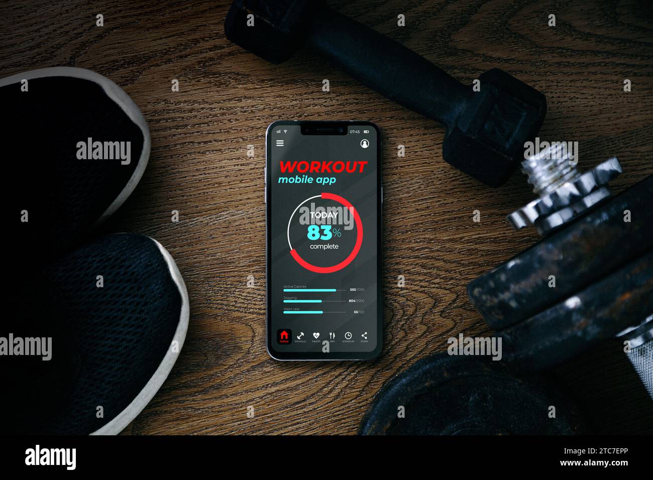 Training application on mobile phone screen. Top view of fitness ...