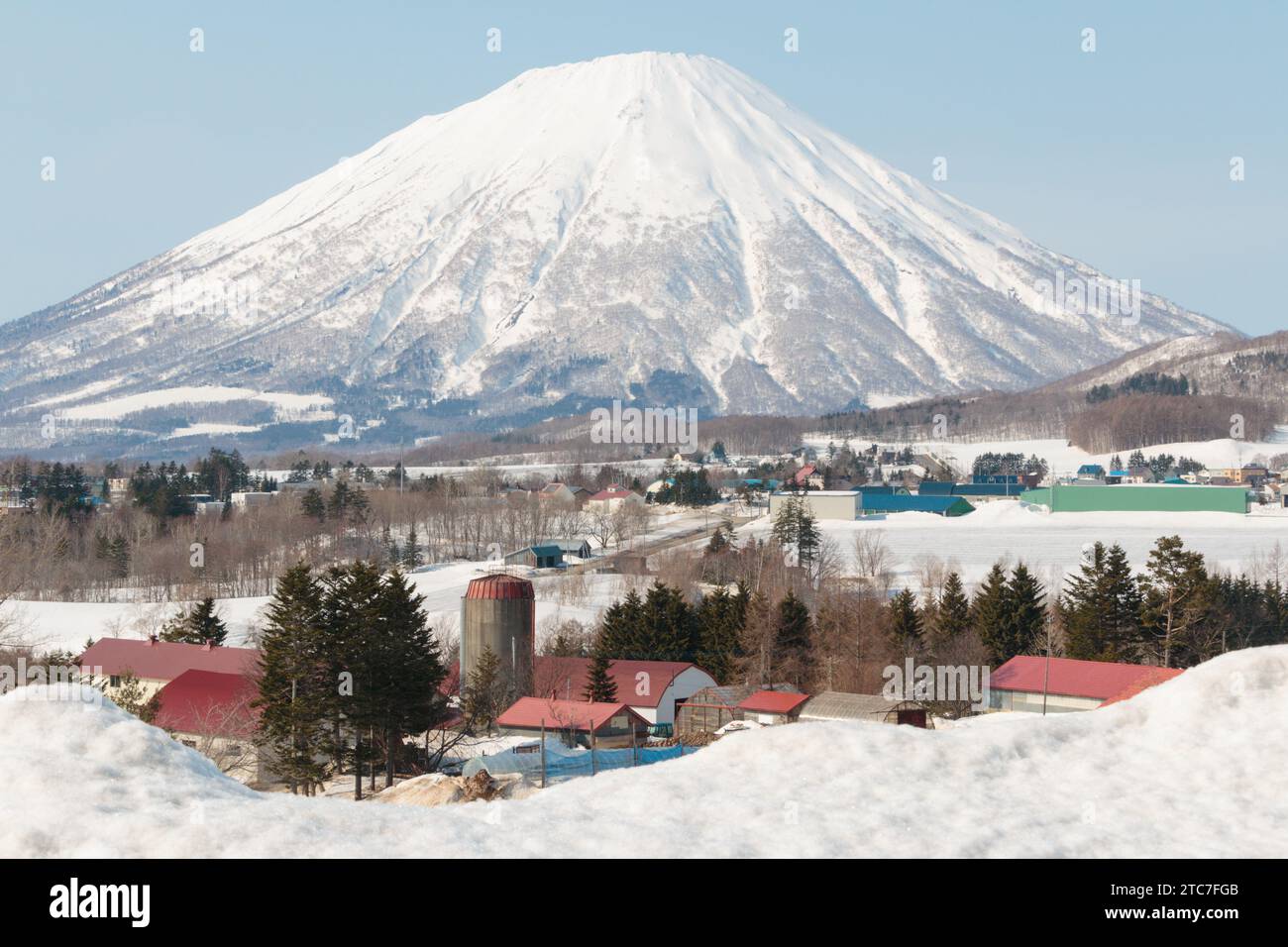 Mount Yotei volcano with agricultural farm in foreground, Hokkaido ...
