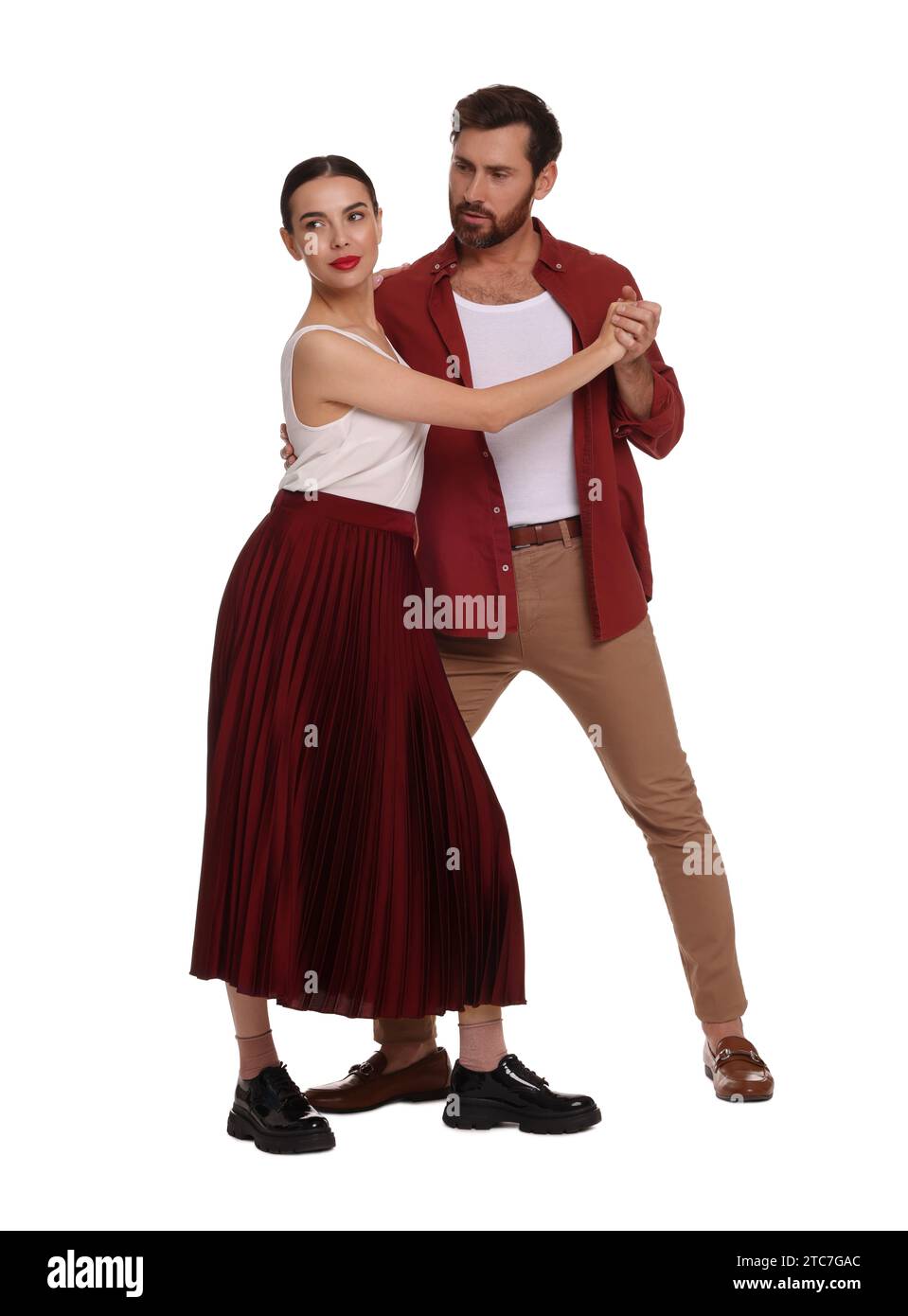Beautiful couple dancing together on white background Stock Photo - Alamy