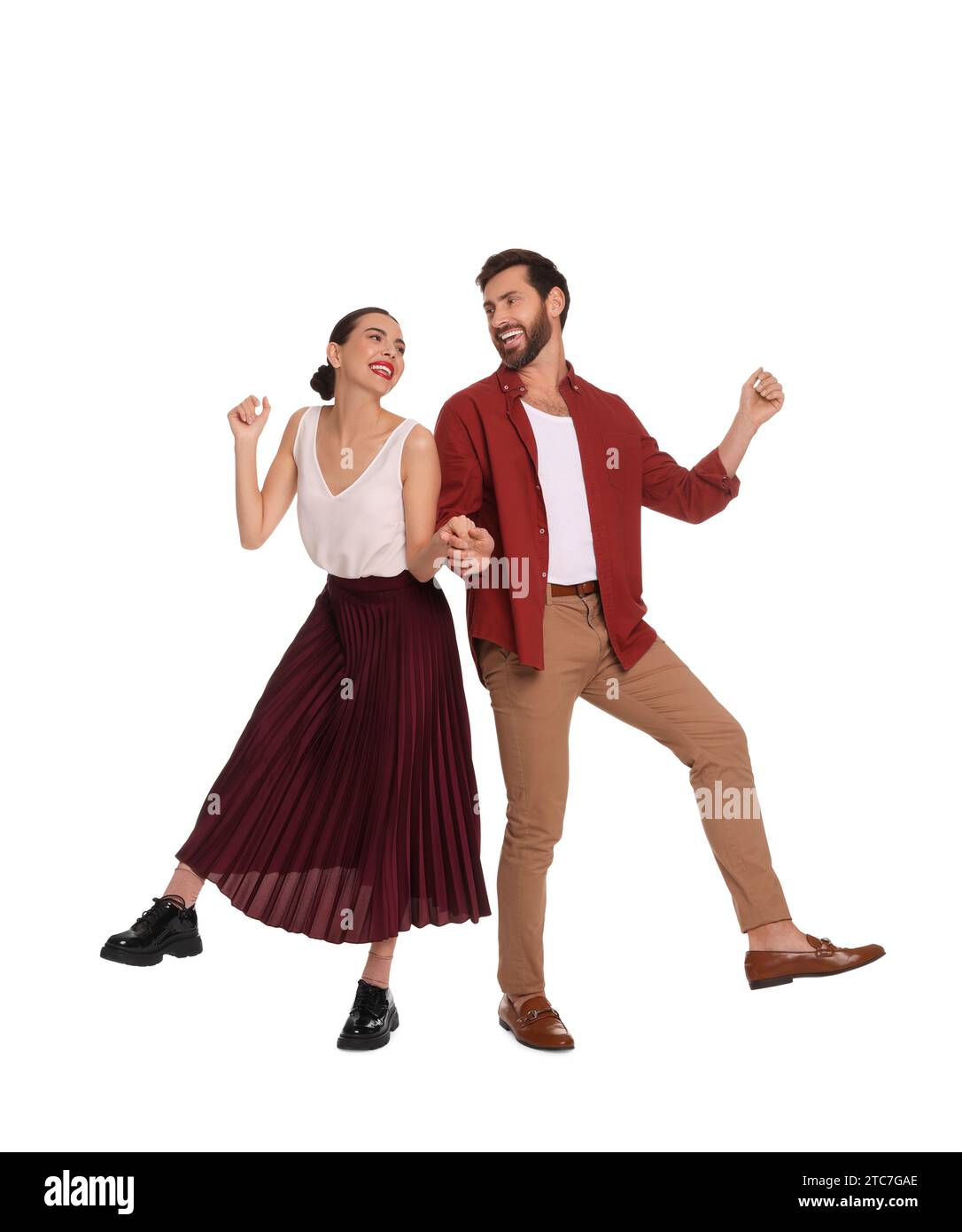 Happy couple dancing together on white background Stock Photo - Alamy