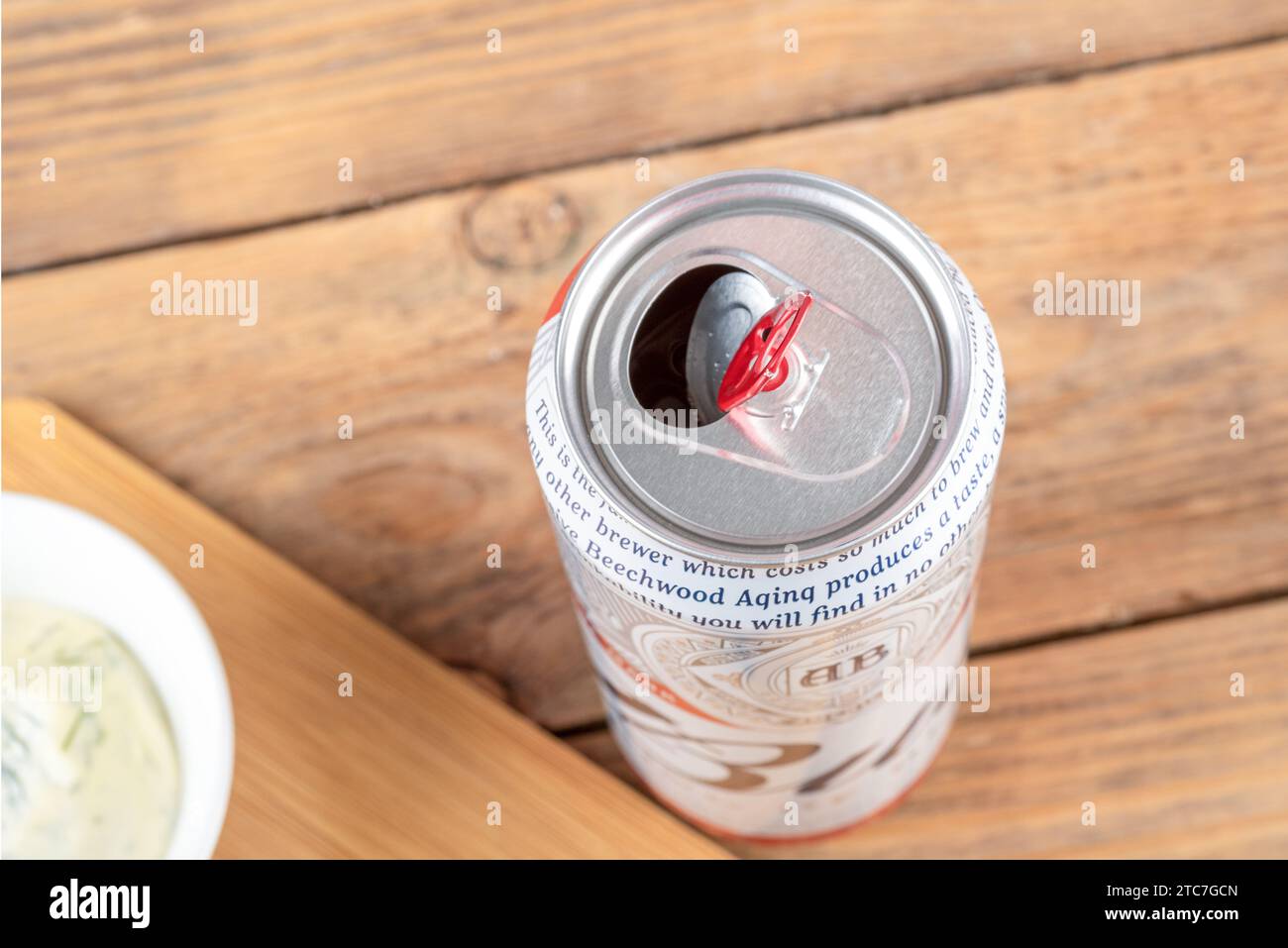 Moscow, Russia - December 08, 2023: Top view of an open can of Bad beer ...