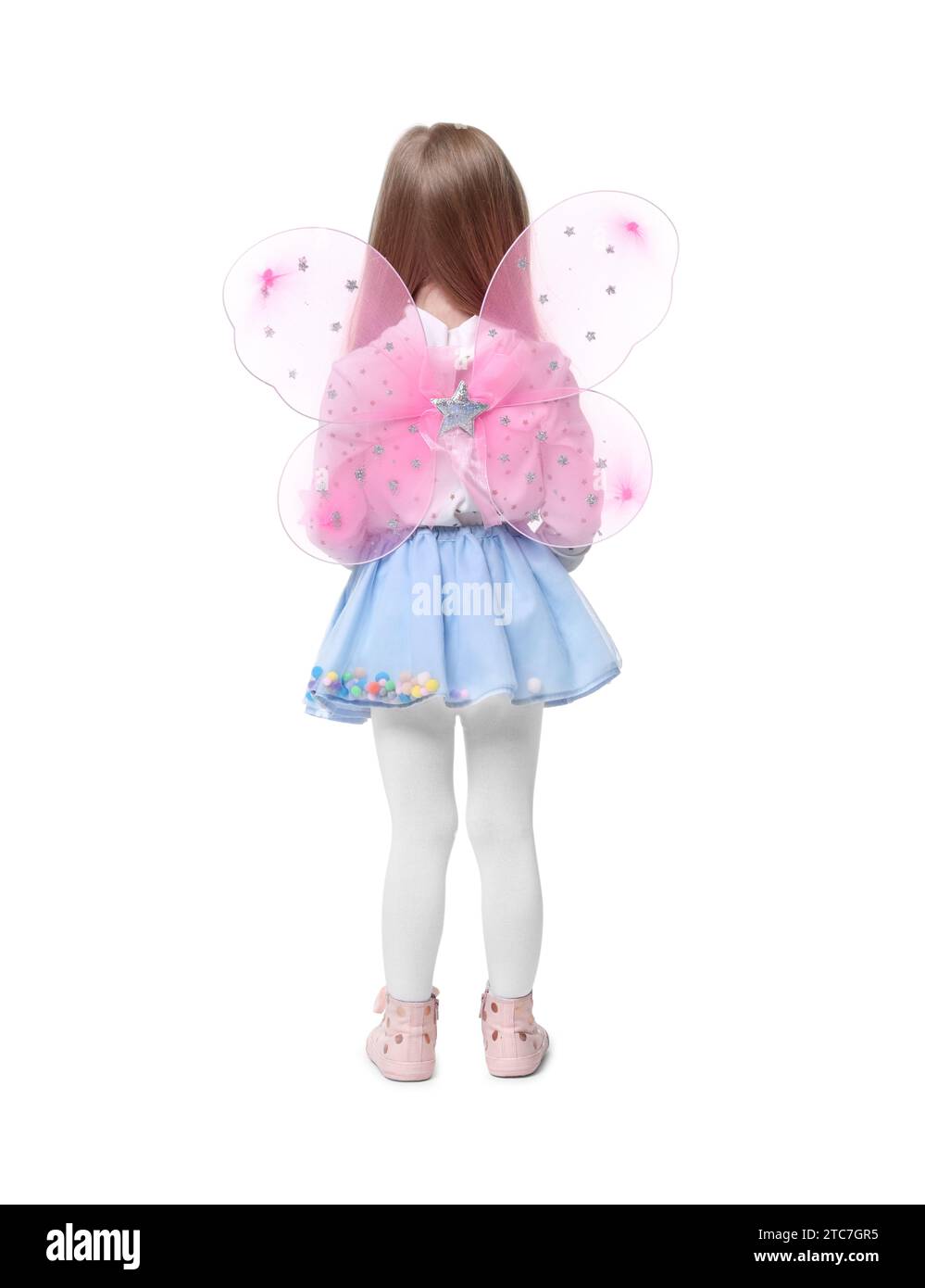 Little girl in fairy costume with pink wings on white background, back ...