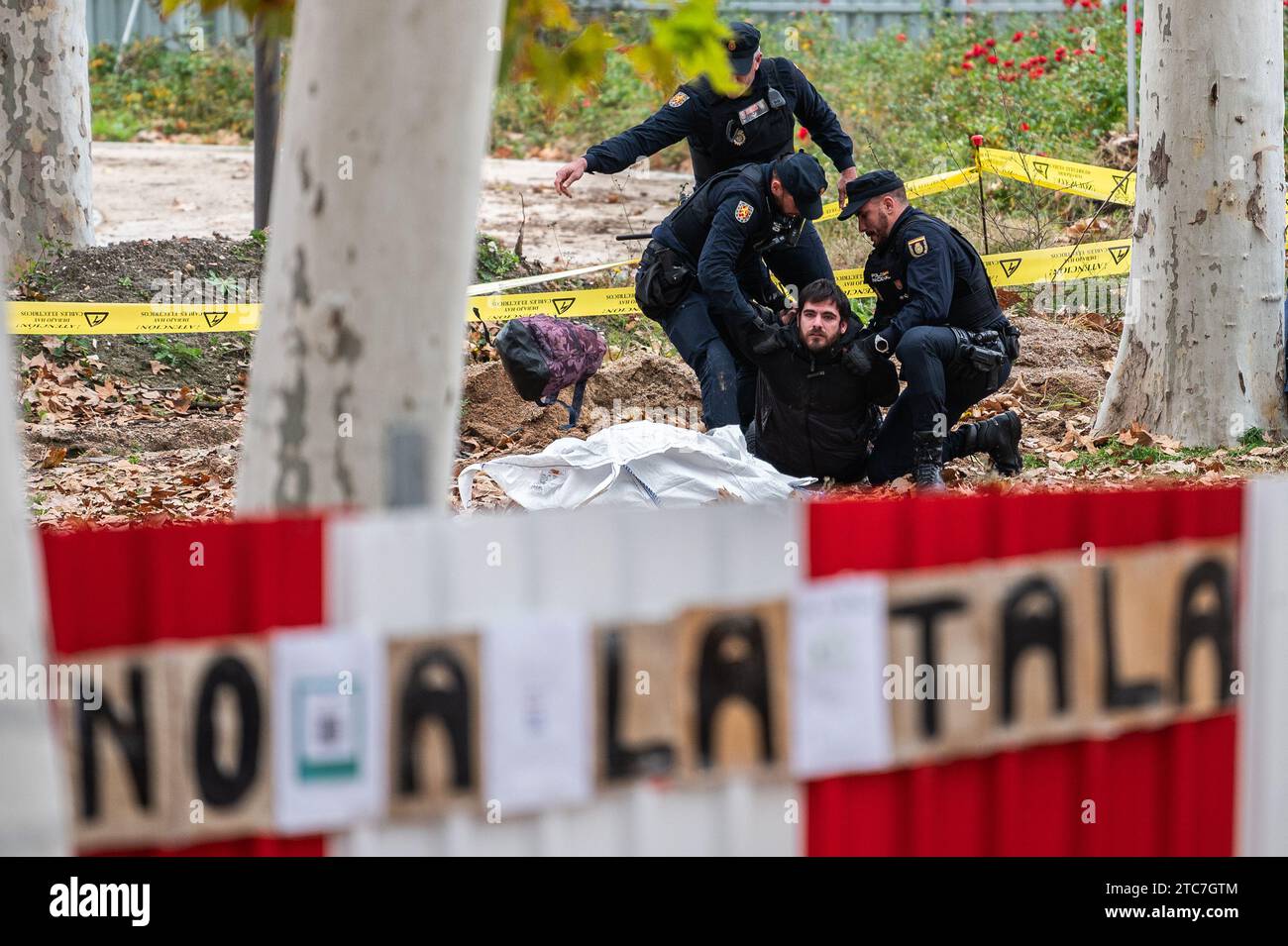 National Police officers remove climate activists who are surrounding ...