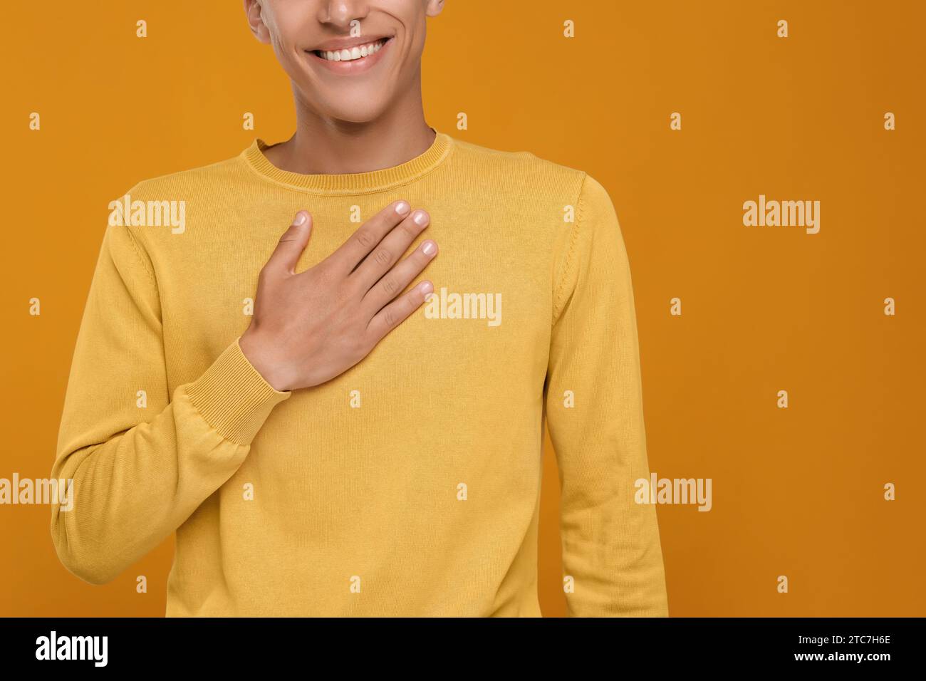 Hand on chest hi-res stock photography and images - Alamy