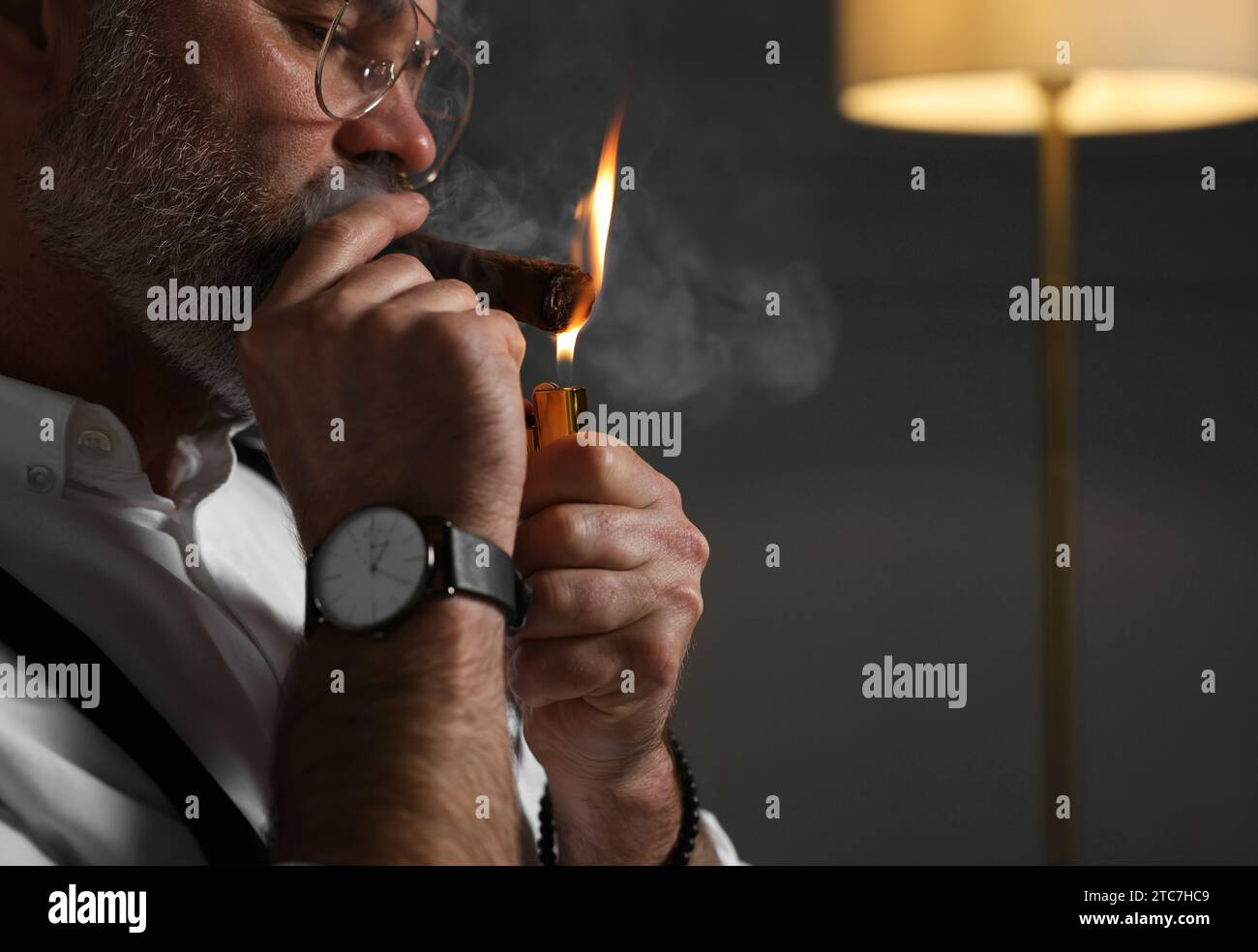 Man lighting cigar hi-res stock photography and images - Alamy