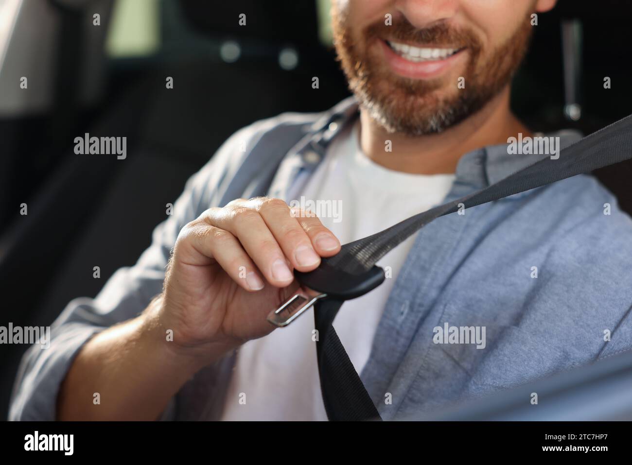 Man passenger sitting in seat fastening belt hi-res stock photography ...