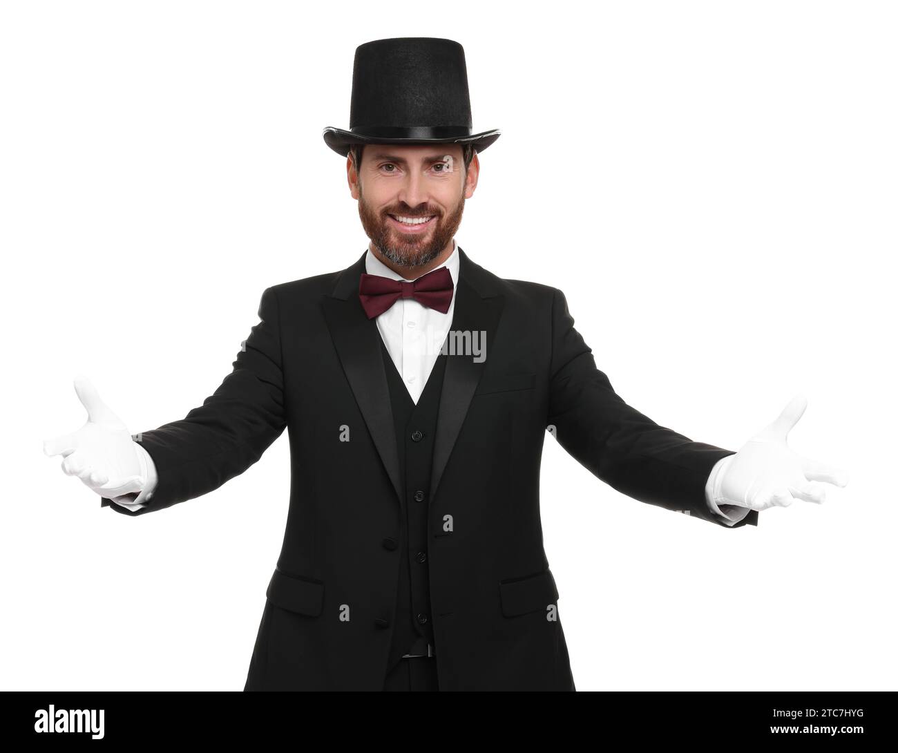 Happy magician in top hat on white background Stock Photo - Alamy