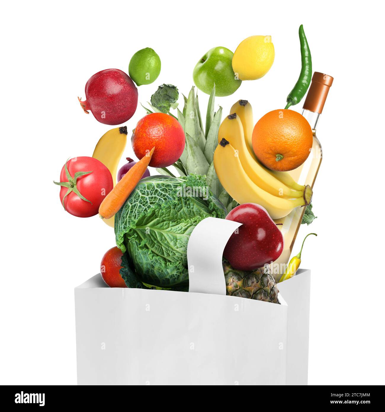 Different food products falling into paper bag on white background ...