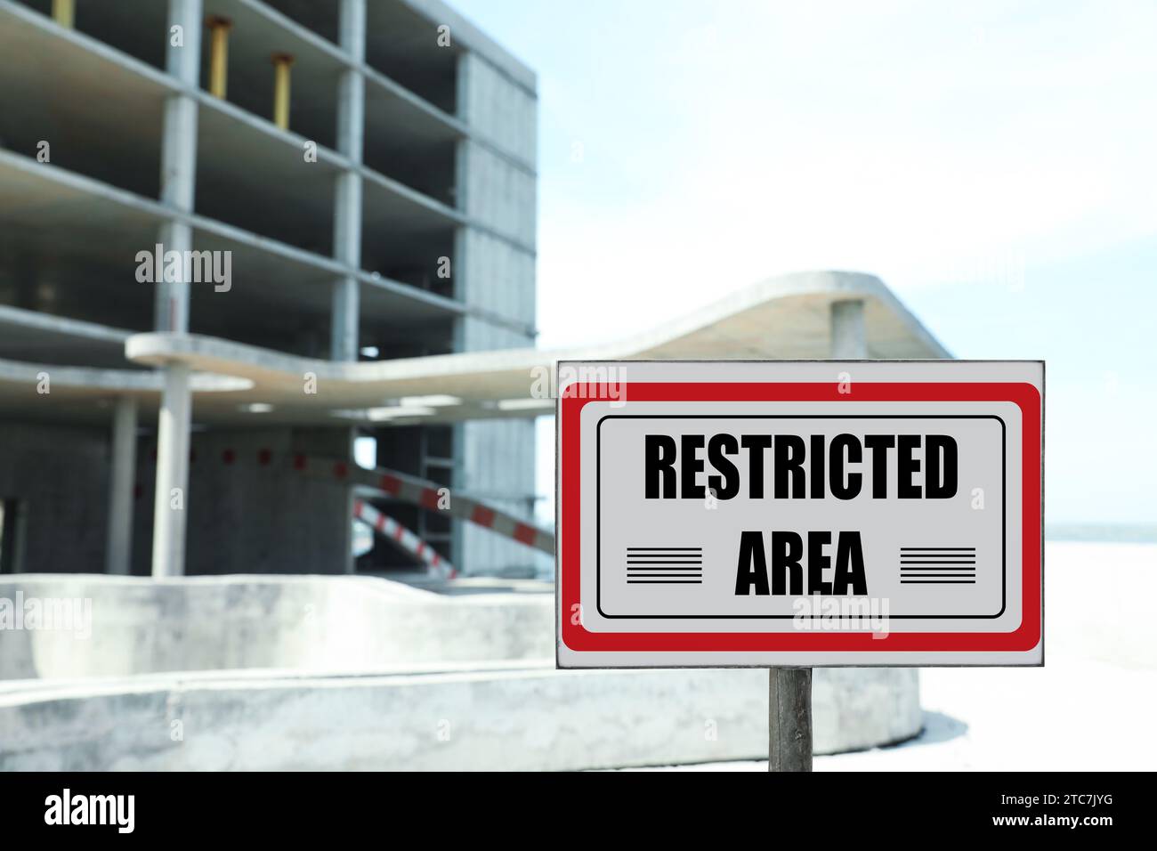 Sign with text Restricted Area near unfinished building outdoors Stock ...