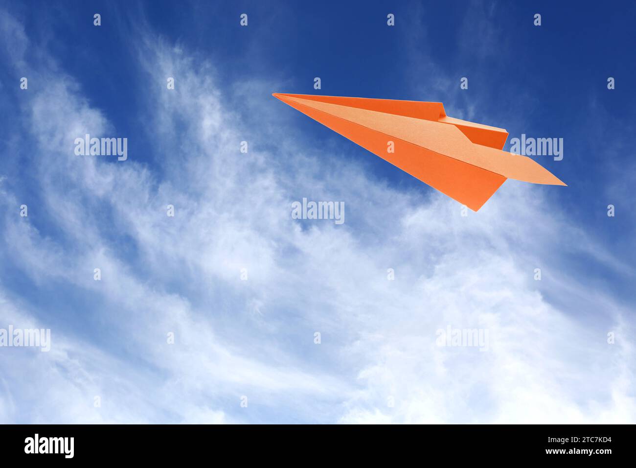Orange paper plane in hi-res stock photography and images - Alamy