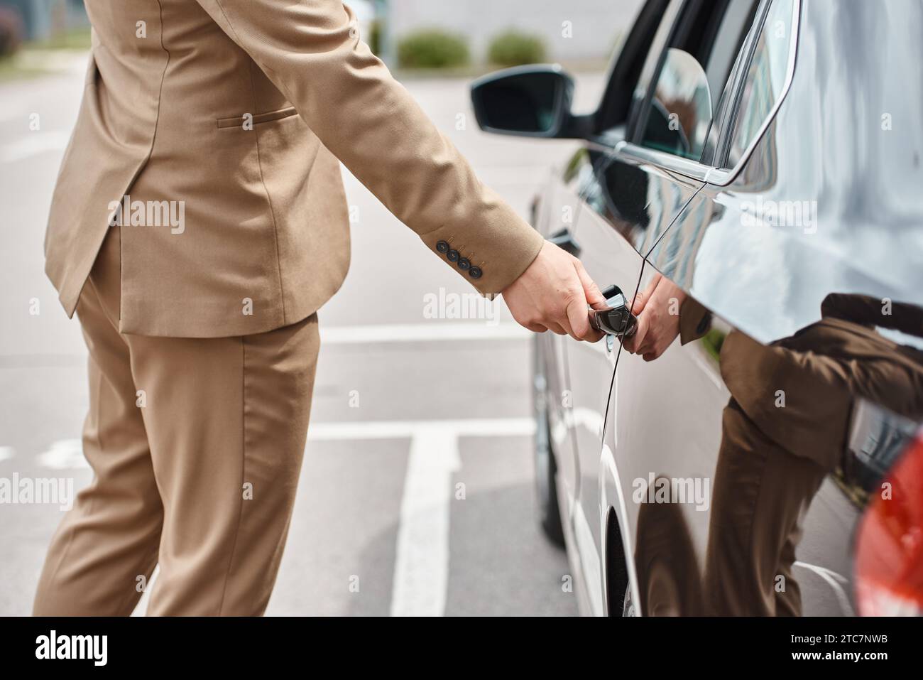Man in beige suit rear view hi-res stock photography and images - Alamy