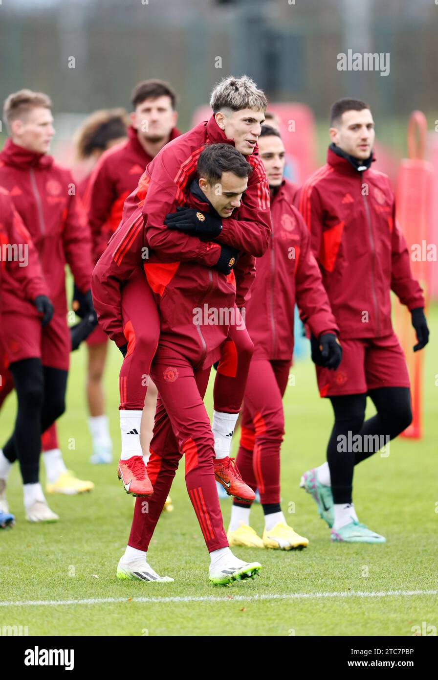 Manchester United's Sergio Reguilon (right) carries team-mate Alejandro ...