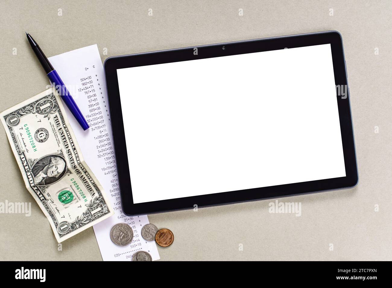 Modern black tablet pc with blank white screen with calculations and US ...