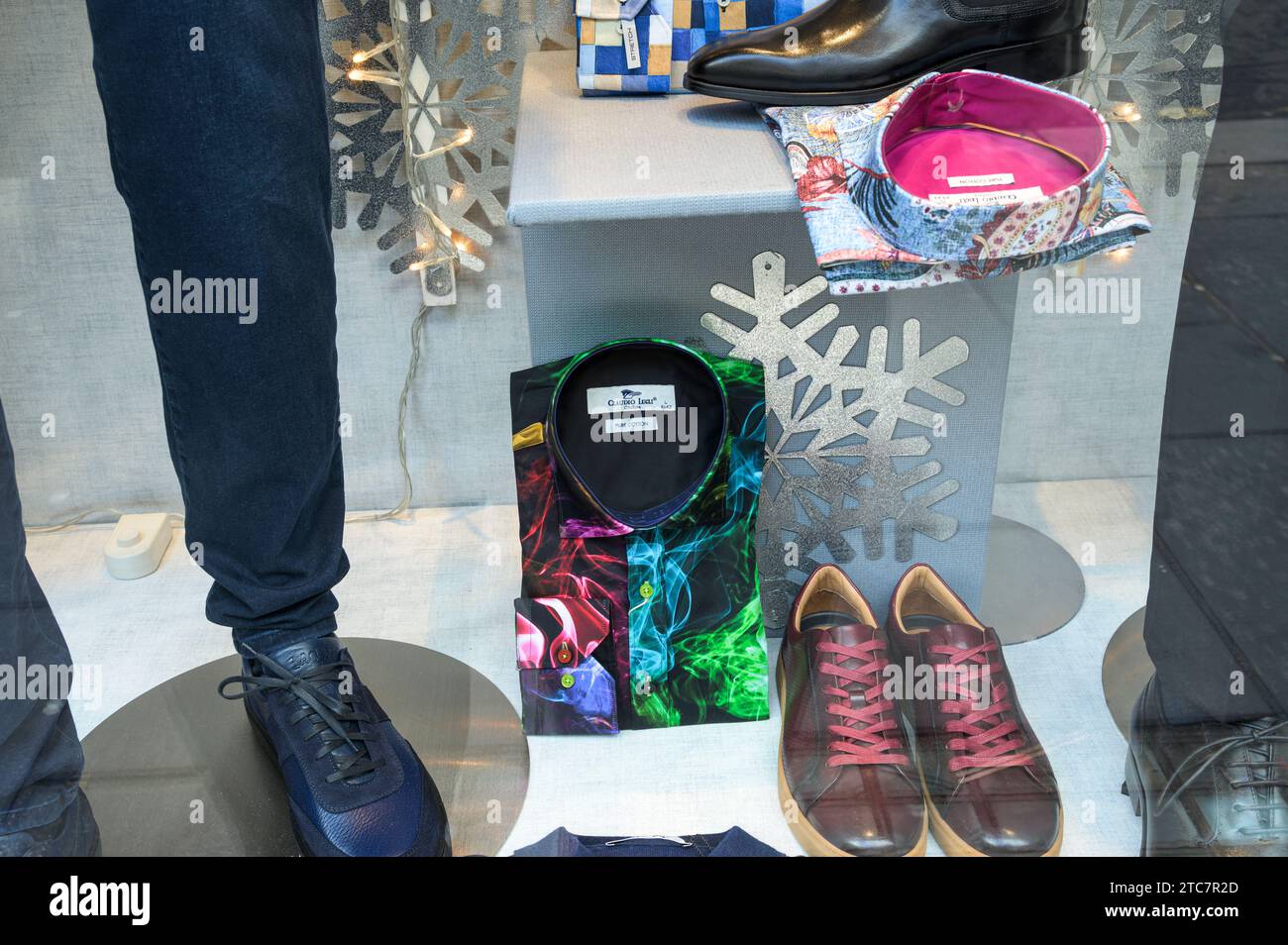 Male designer clothing on display in a shop window, Glasgow, Scotland ...