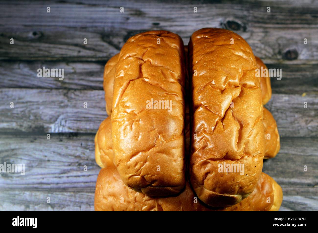 Long bun bread, a fresh baked loaf of bread French Fino ready to ...