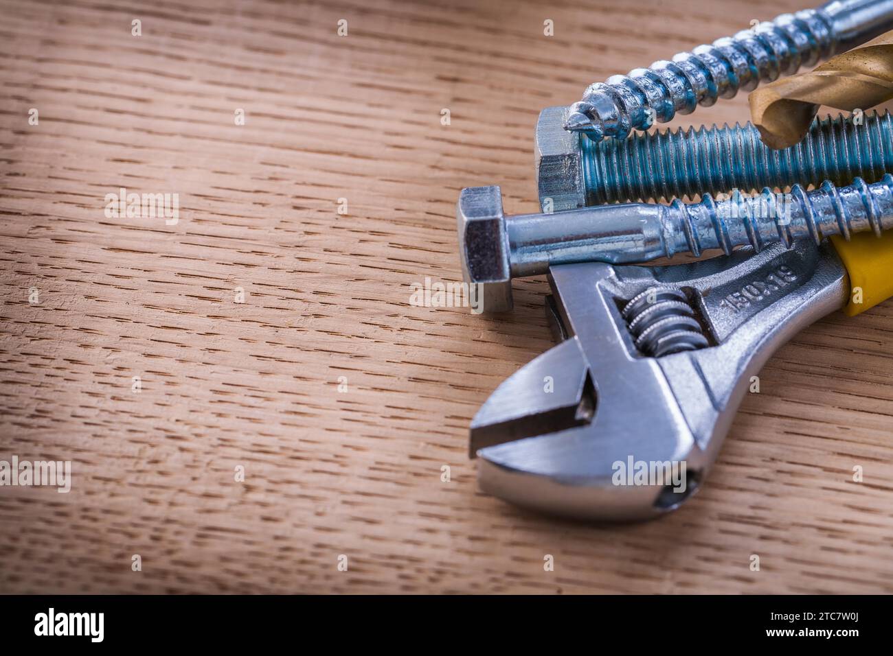 Horizontal view close up view screws adjustable wrench drill and bolt ...